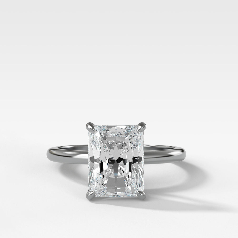 Crescent Solitaire Engagement Ring With Elongated Radiant Cut Diamond