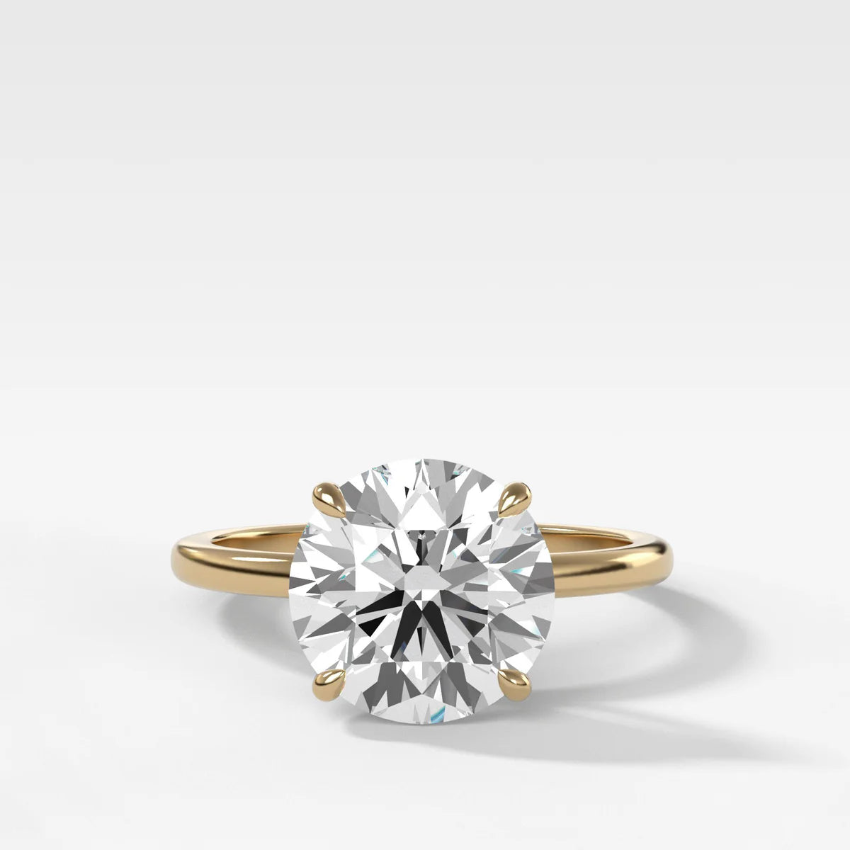 Crescent Solitaire Engagement Ring With Round Cut Diamond