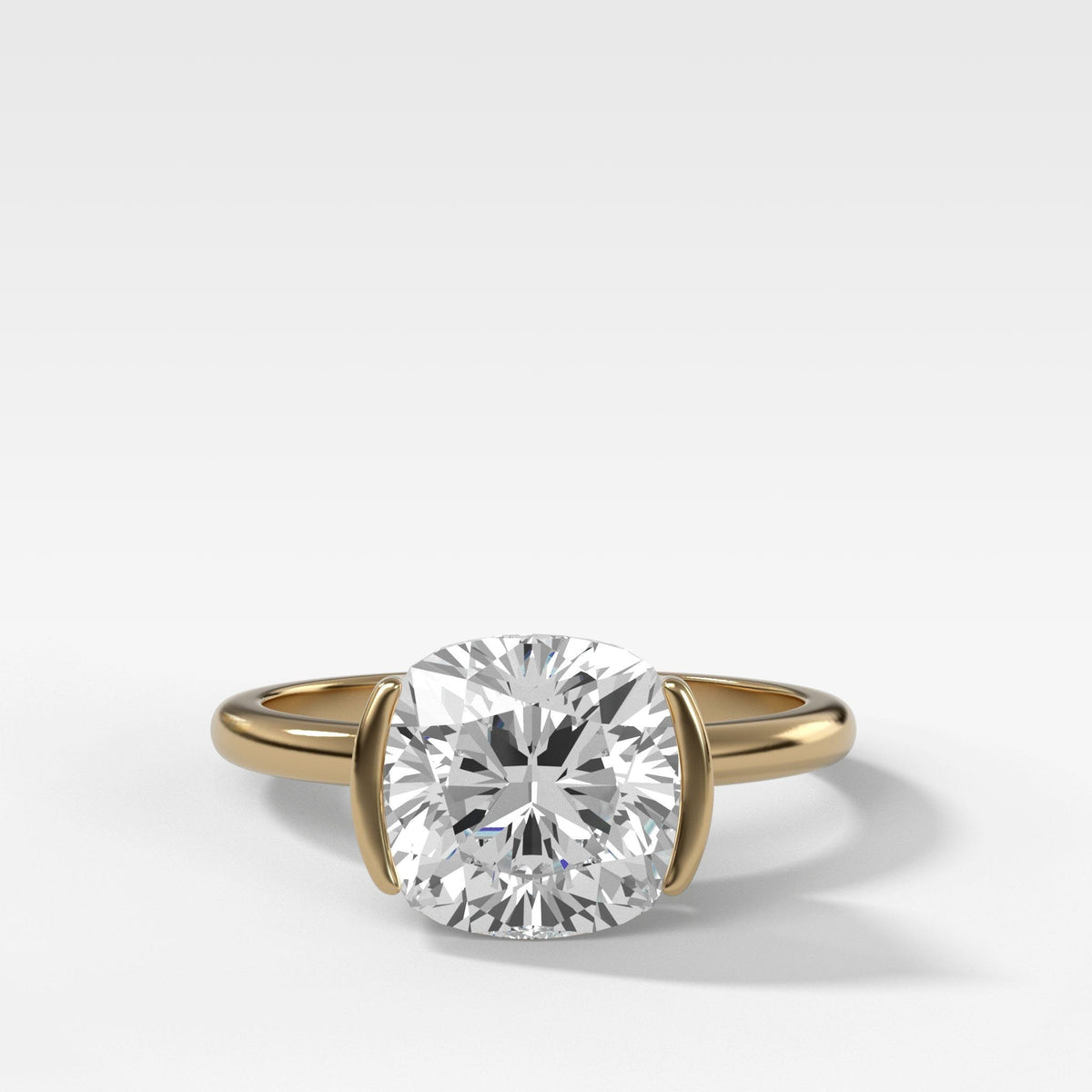 Half Bezel Solitaire Engagement Ring With Cushion Cut Diamond