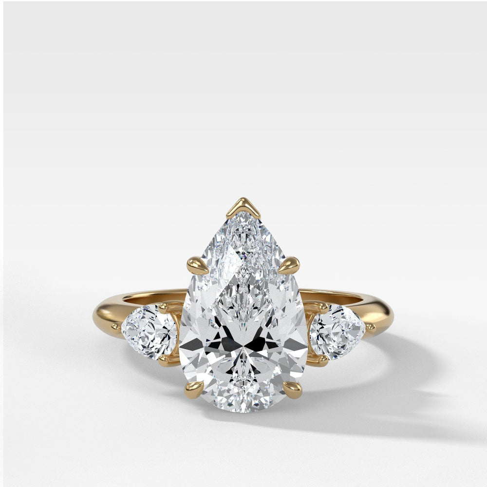 Three Stone Engagement Ring With Pear Side Stones and Pear Cut Diamond